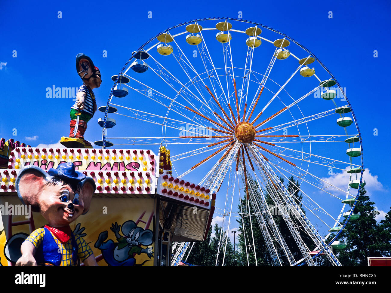 Ferris big wheel at fun fair Stock Photo - Alamy