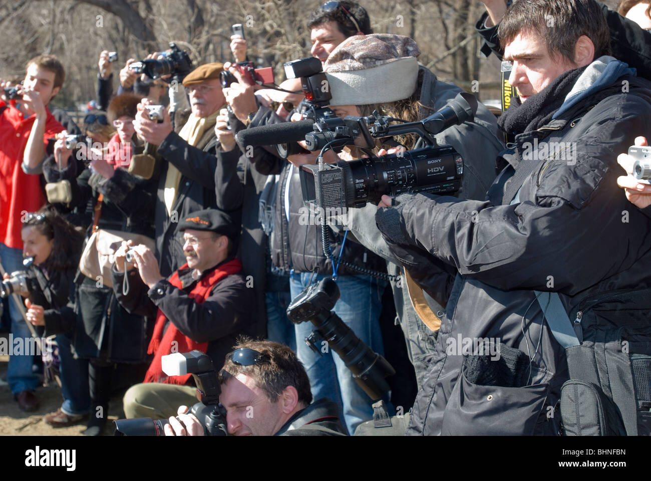 Photographers and videographers line up for a photo op in Central Park ...