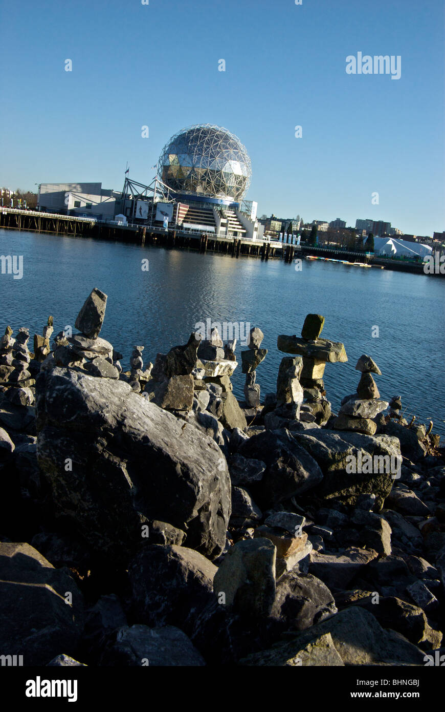 Artistic colony of balanced stone Inuit style Inukshuks logo symbol of ...