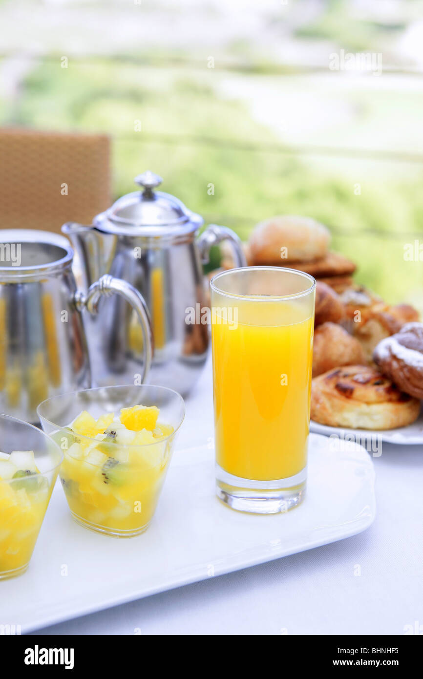 Breakfast with orange juice coffee milk and tea bakery Stock Photo - Alamy