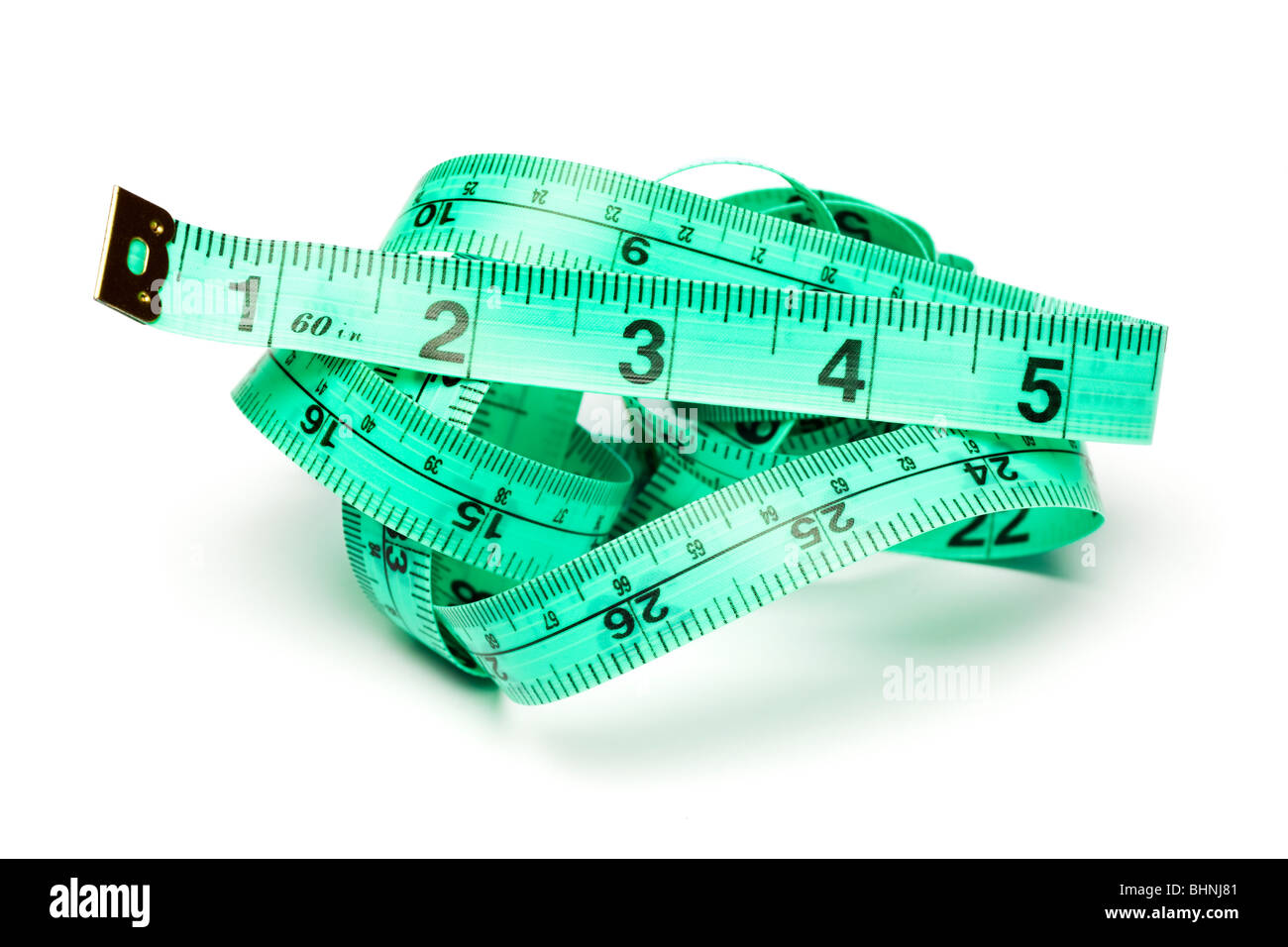 Tape measure cut out on white background Stock Photo - Alamy