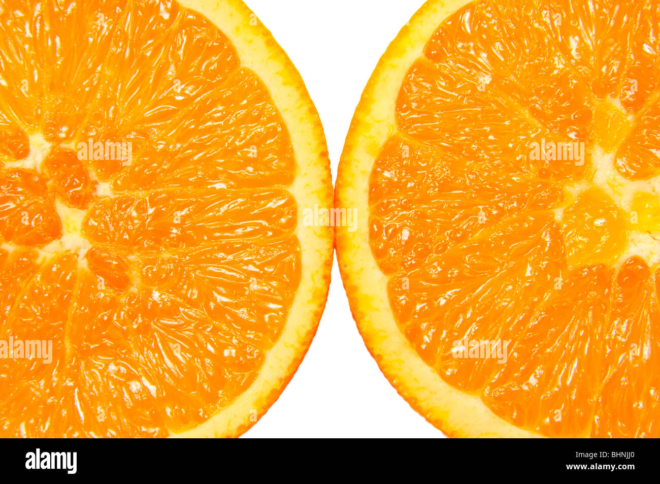 Two halves orange by oneself on the white background Stock Photo - Alamy
