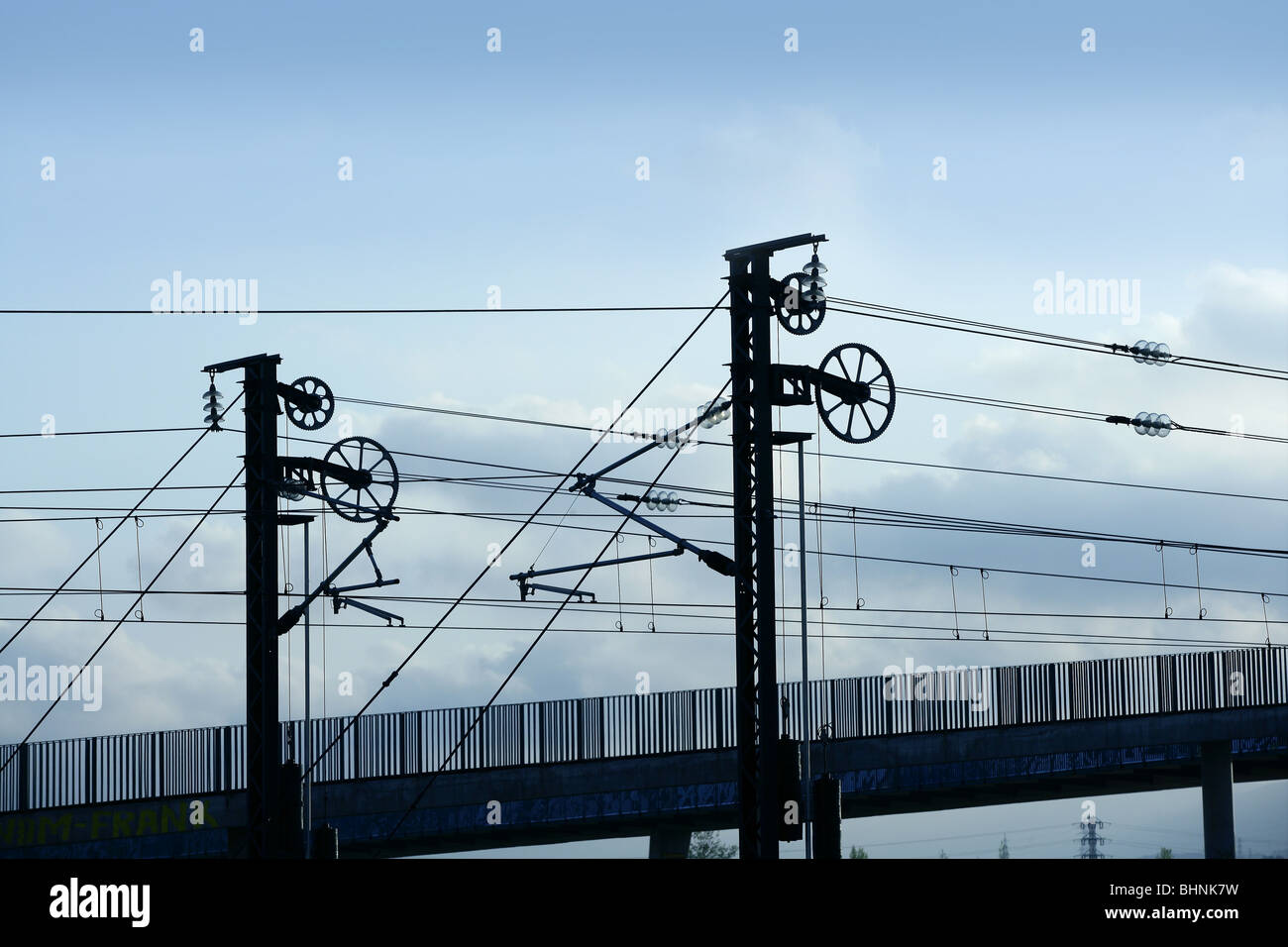 Cables and pole tower electric train railway Stock Photo - Alamy