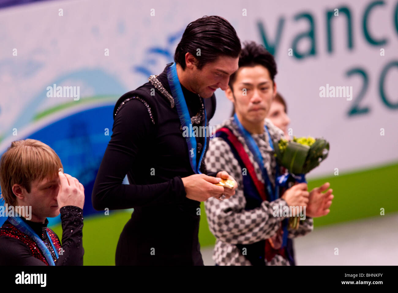 Evan Lysacek (USA) receives his gold medal for the Figure Skating Men's ...
