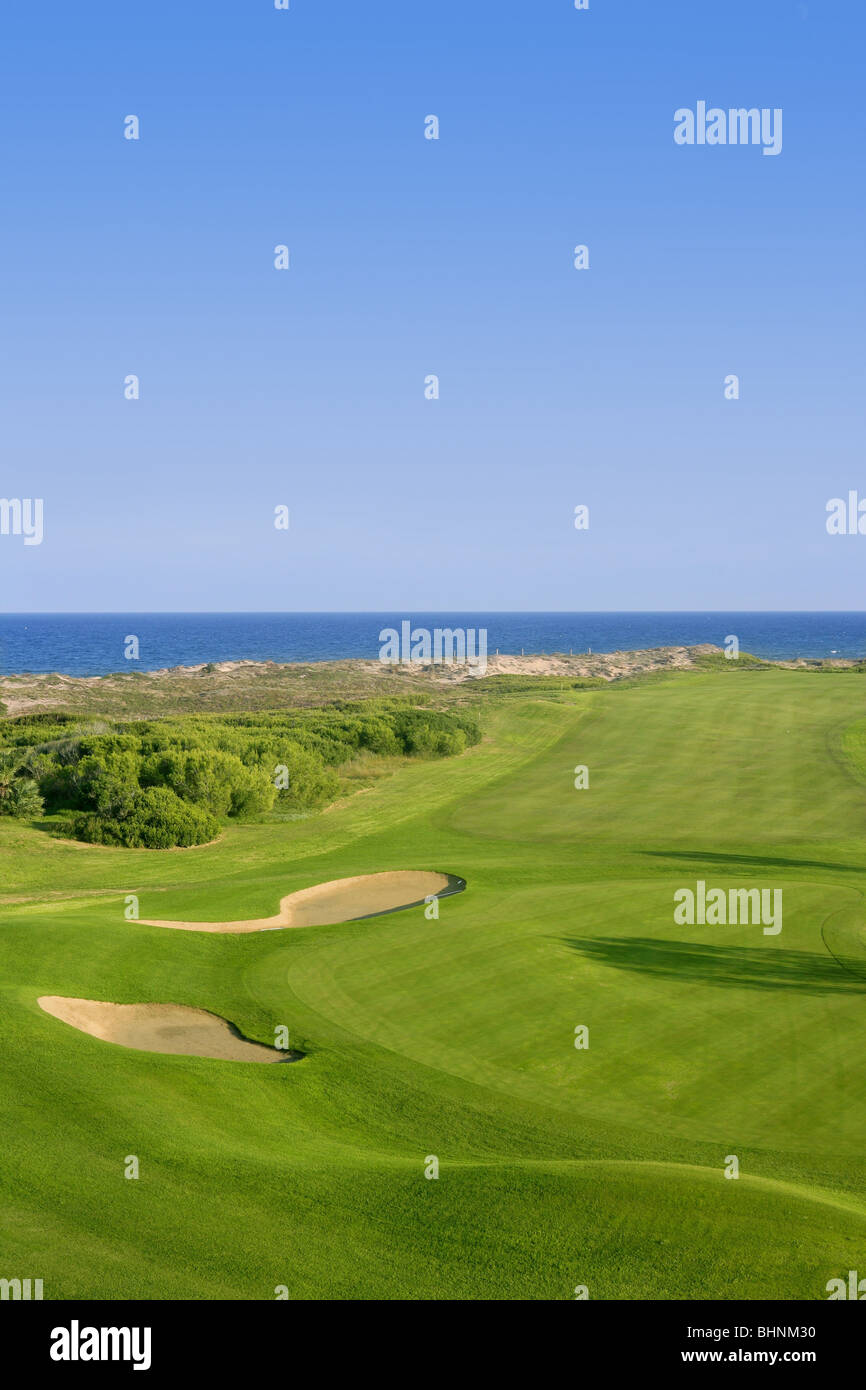 Golf course green grass, sea ocean and summer blue sky Stock Photo - Alamy