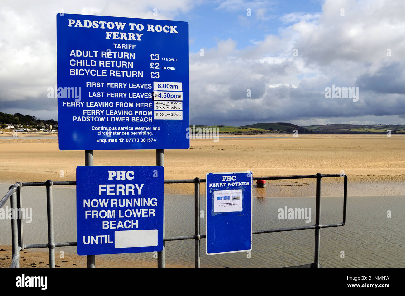 the timetable sign for the " padstow to rock " ferry across the river ...