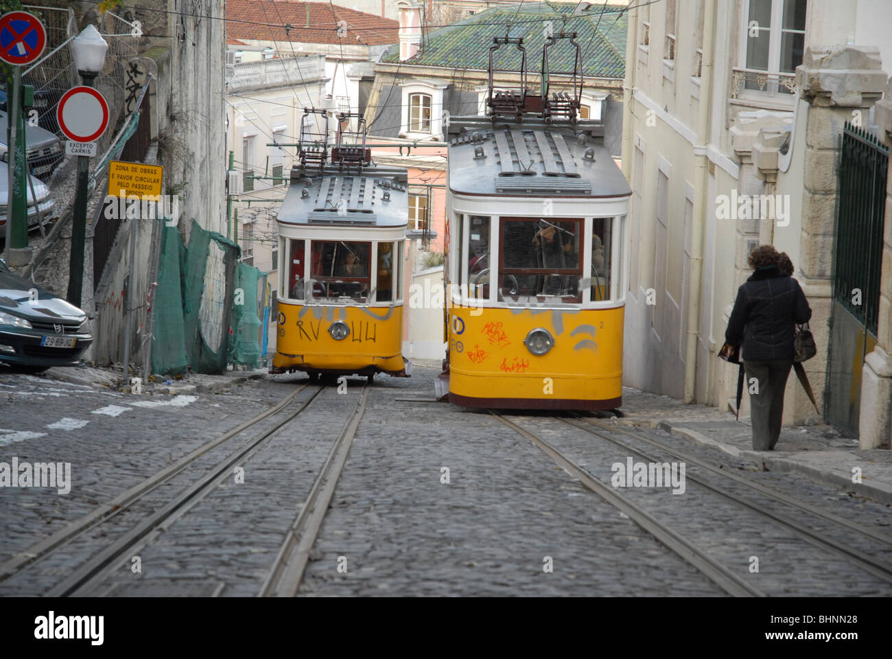 Two historic yellow funicular tram in old Lisbon, Portugal. - Copyright ...