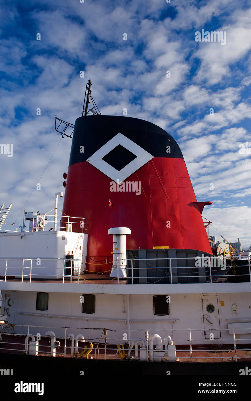 Ship stack against a blue sky scattered with clouds Stock Photo - Alamy
