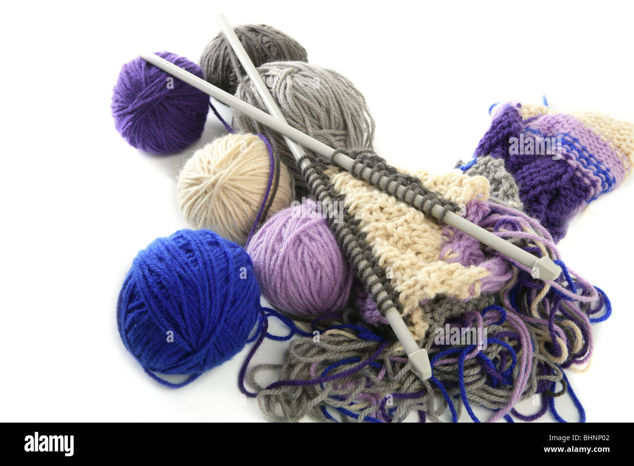 colorful knitting tools with wool thread balls Stock Photo - Alamy