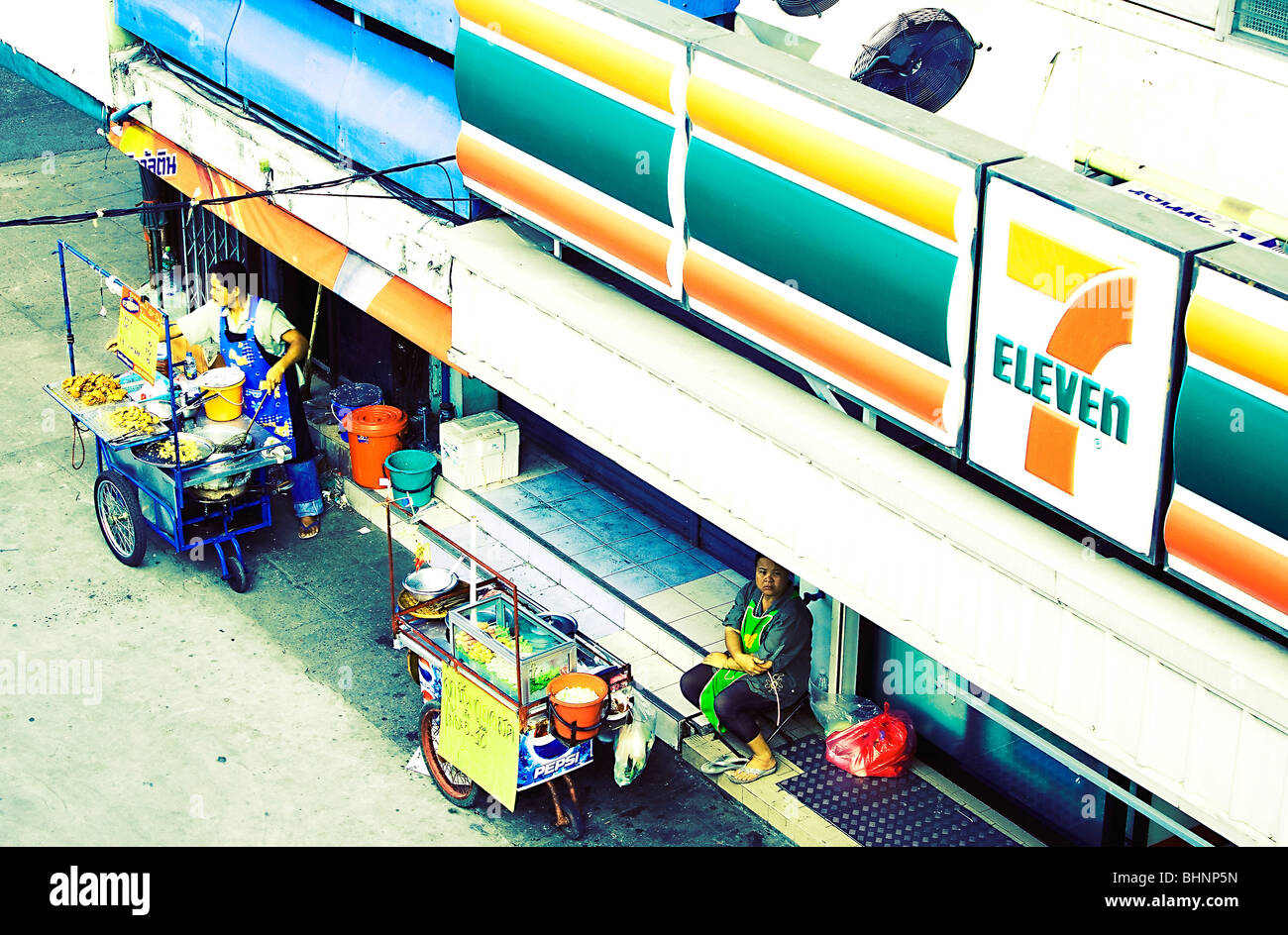 Vendors outside Convenience Store Bangkok Thailand Stock Photo - Alamy