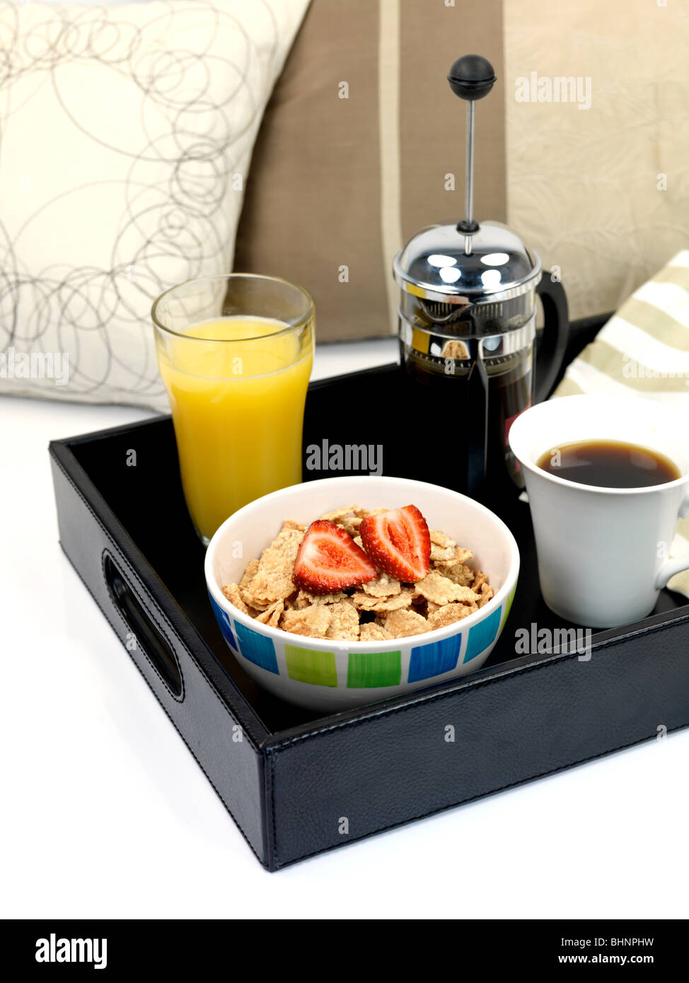 A breakfast tray with fresh coffee, cereal and orange juice Stock Photo ...
