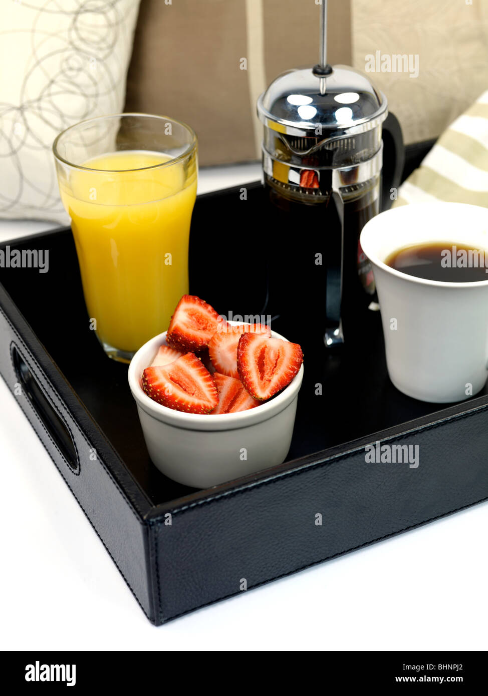 A breakfast tray with fresh coffee, cereal and orange juice Stock Photo ...