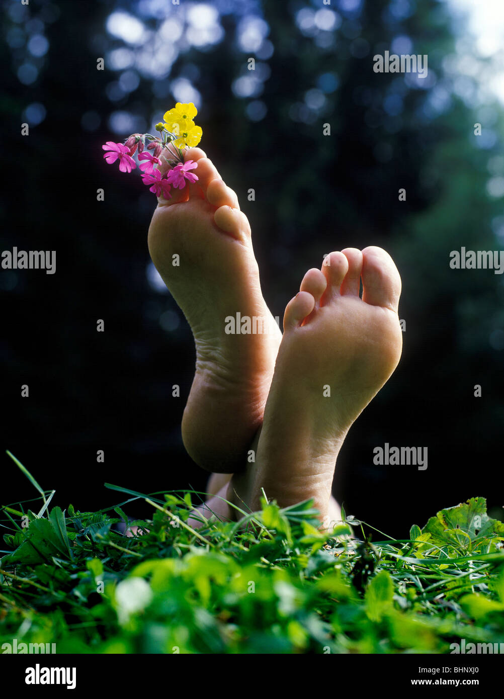 foot with flower Stock Photo - Alamy