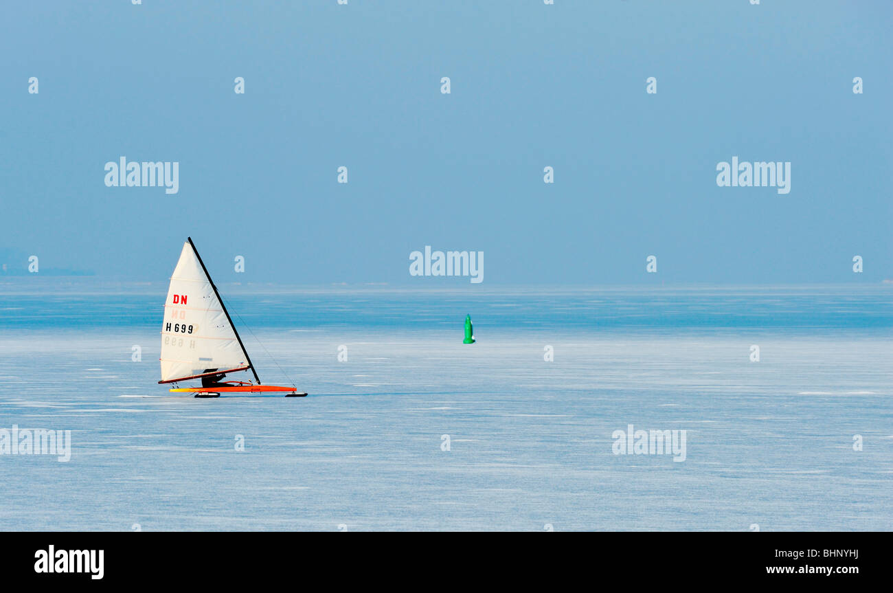 Ice sailing on the frozen lake (gouwzee Between Edam and Marken ...