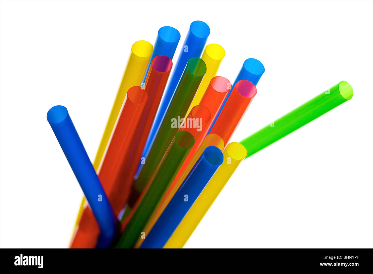 a bunch of straws against a white background Stock Photo - Alamy