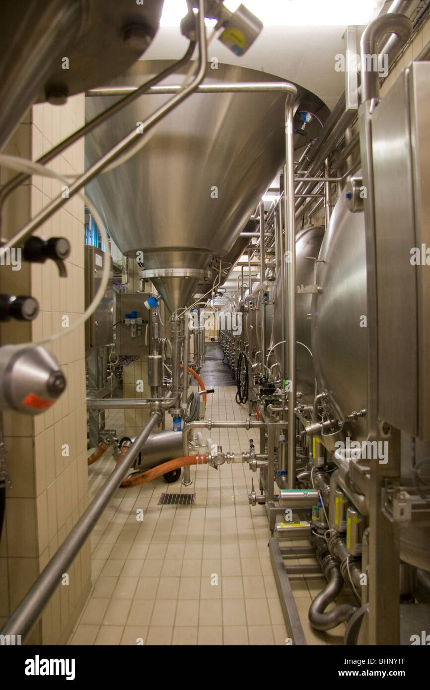 Stainless steel storage vats at a brewery Stock Photo - Alamy