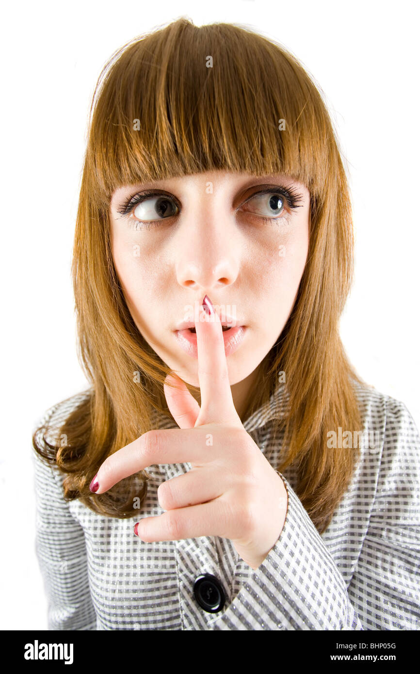 Pretty girl making a silence sign Stock Photo - Alamy