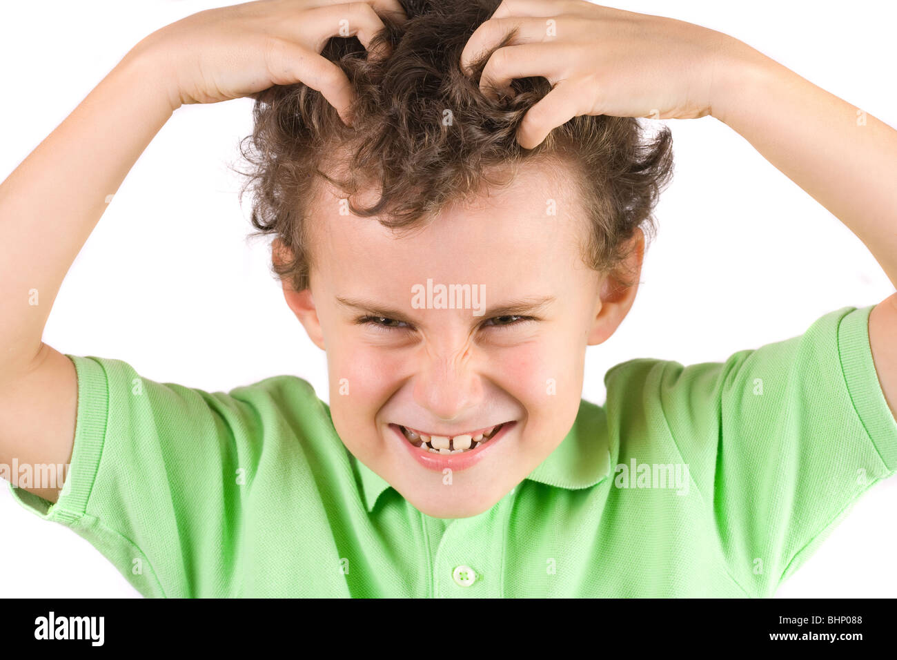 Portrait of an angry kid isolated on white background Stock Photo - Alamy