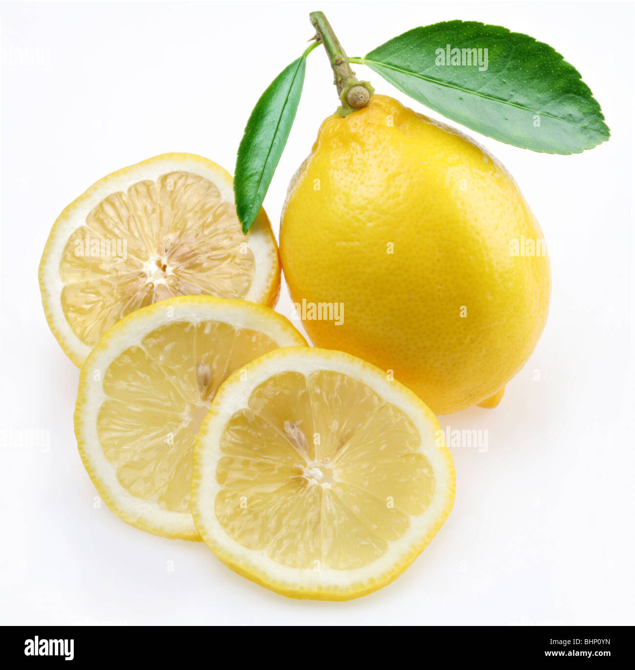 Lemon with section on a white background Stock Photo - Alamy