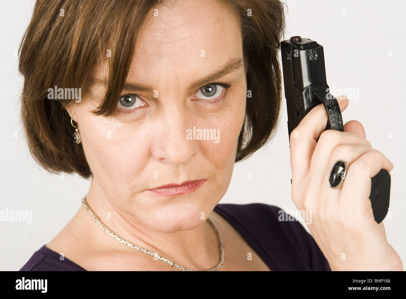 Angry woman gun Stock Photo - Alamy