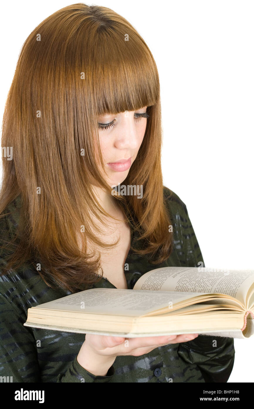 Close-up portrait of a girl reading a book, isolated on white Stock ...