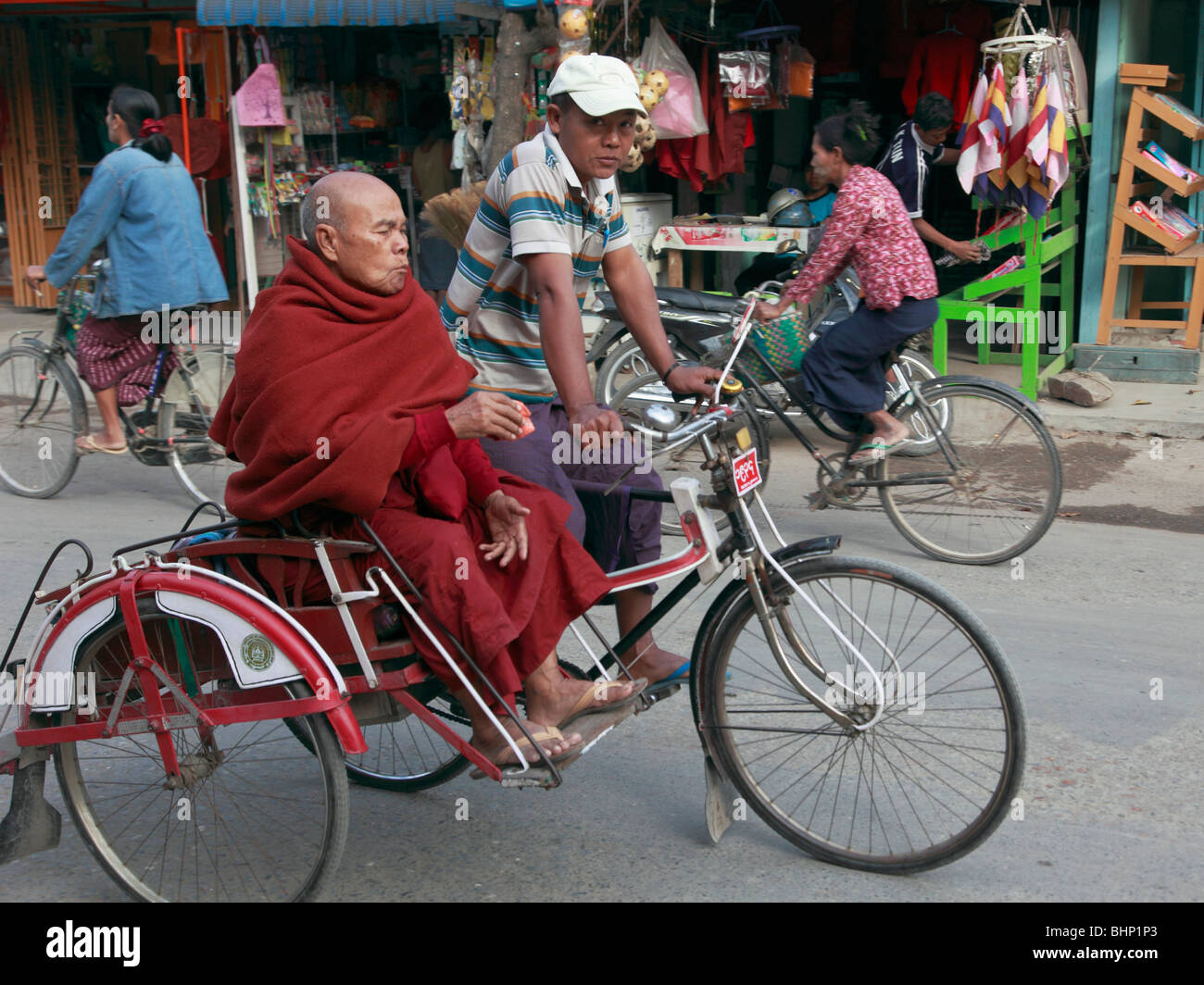 Myanmar, Burma, Mandalay, monk in a trishaw, street scene Stock Photo ...