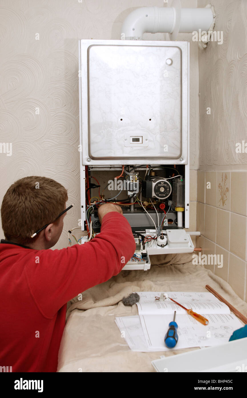 Installing boiler hi-res stock photography and images - Alamy