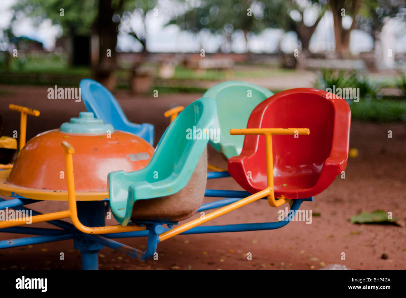 Playground roundabout hi-res stock photography and images - Alamy