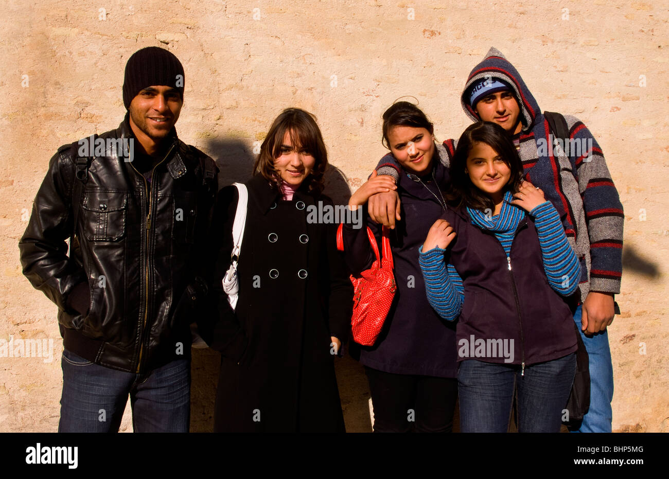 Modern Tennagers outside Medina of the famous Holy Muslim city of ...