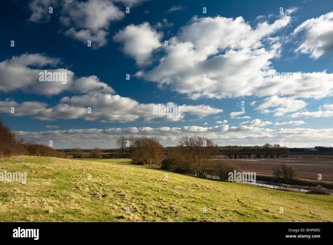 Upper reaches of the River Thames from a hillside on the Thames Path ...