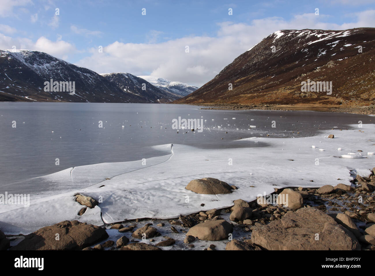 frozen surface of Loch Turret Reservoir Glen Turret Perthshire Scotland ...