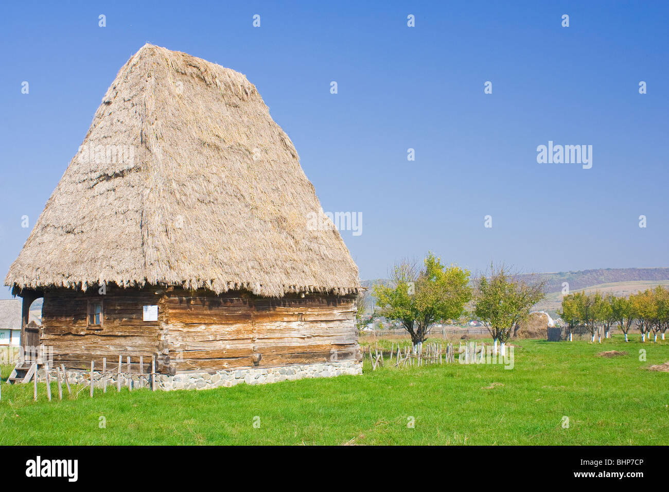 Old houses with roof of thatch Stock Photo - Alamy