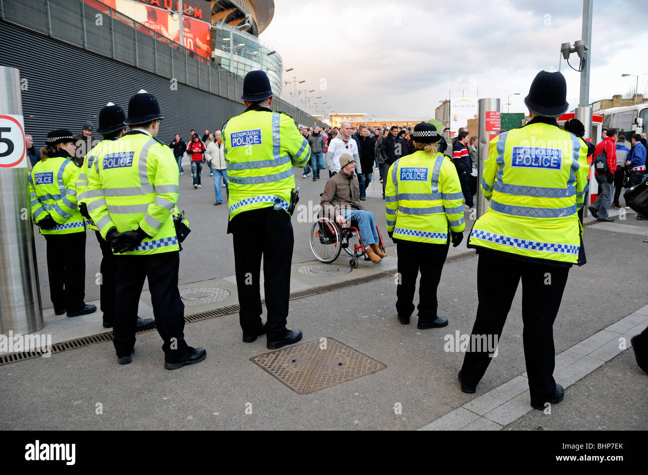 Metropolitan Police Officers and fans outside Arsenal's Emirates ...