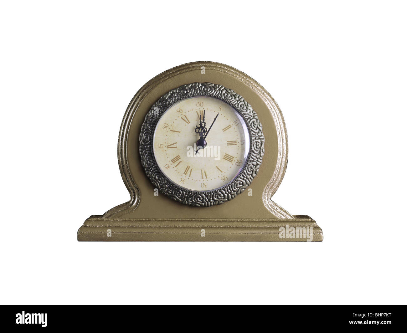 Golden table clock showing twelve o'clock isolated on white background ...