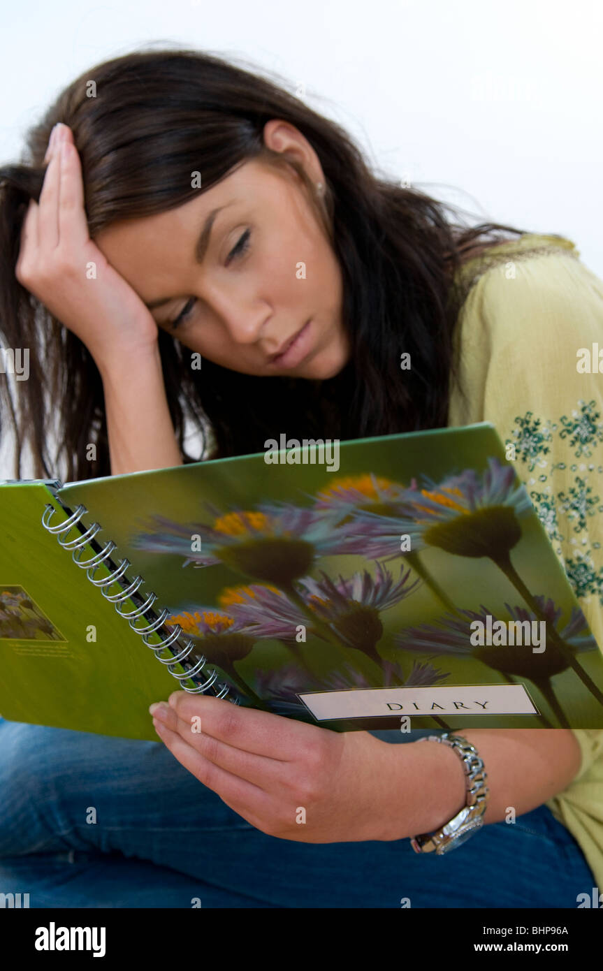young woman teen with diary sad Stock Photo - Alamy