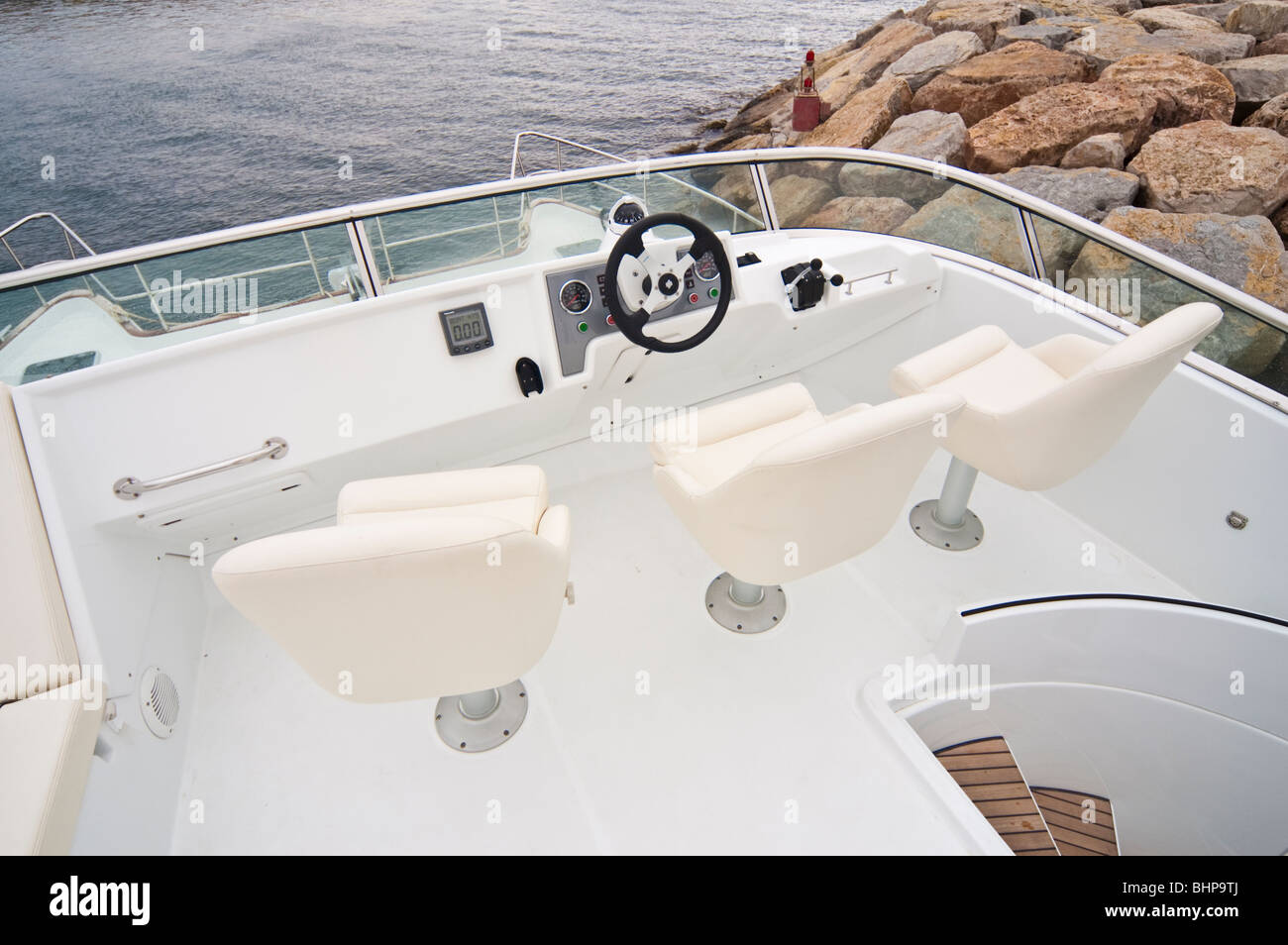 Helm with instruments and compass on the flybridge of a Lagoon 44 Power ...