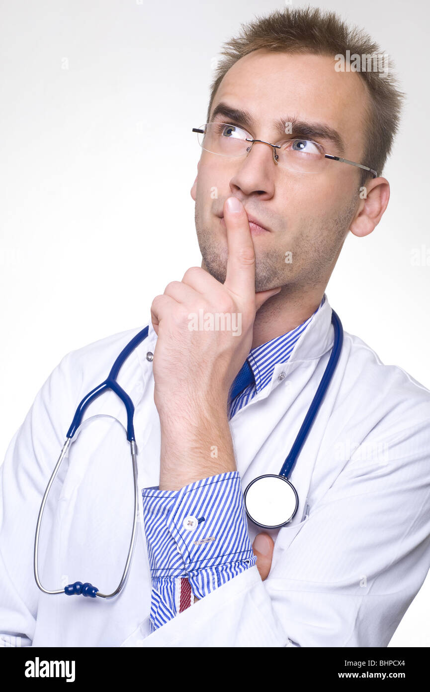Portrait thinking male doctor hi-res stock photography and images - Alamy