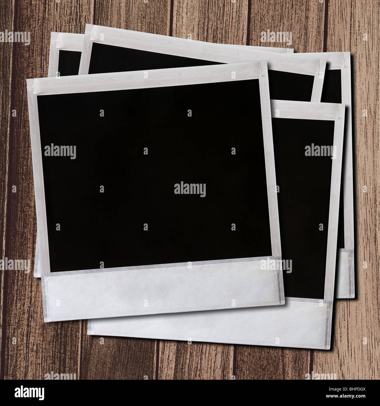 Instant Camera Frame on real wood texture Stock Photo - Alamy