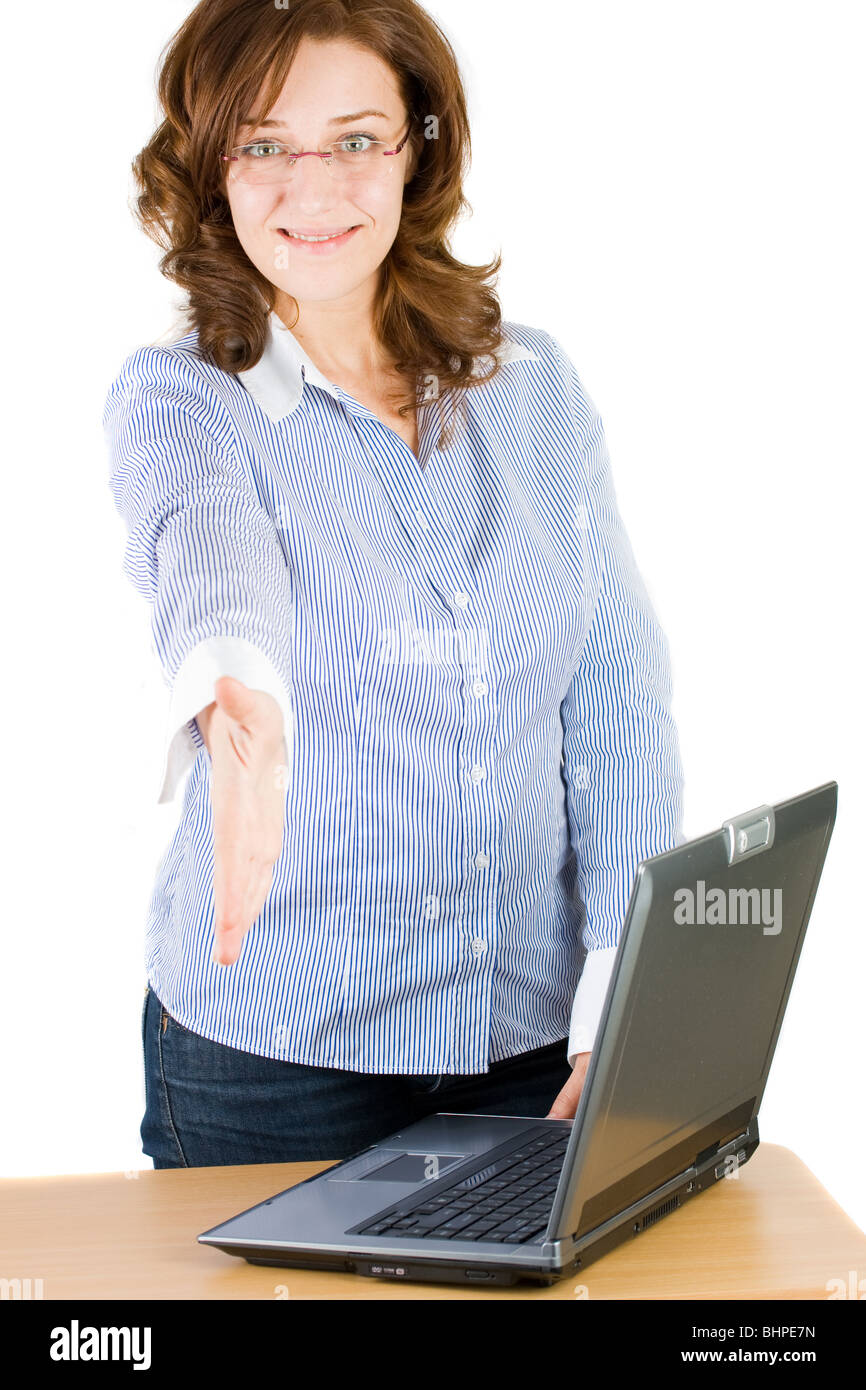 Beautiful businesswoman ofering a friendly handshake Stock Photo - Alamy