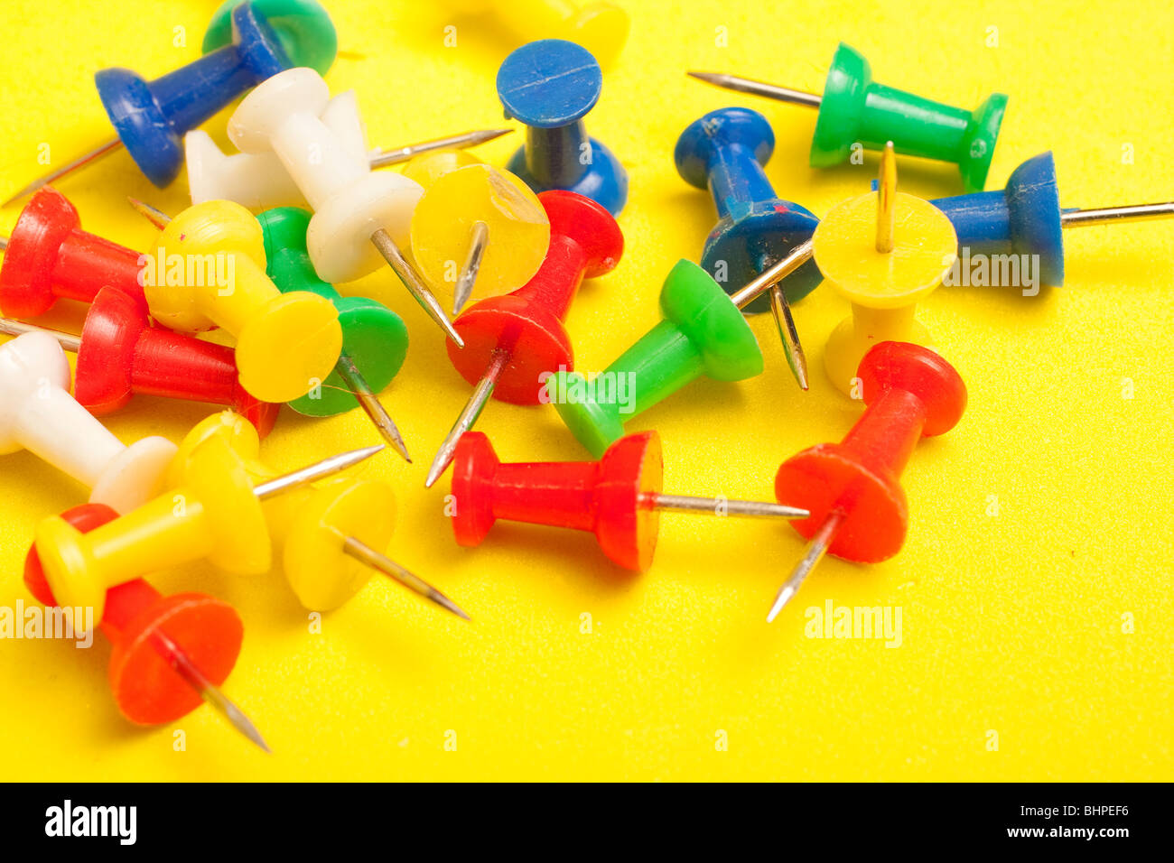 Tacks on A Yellow Background Stock Photo - Alamy