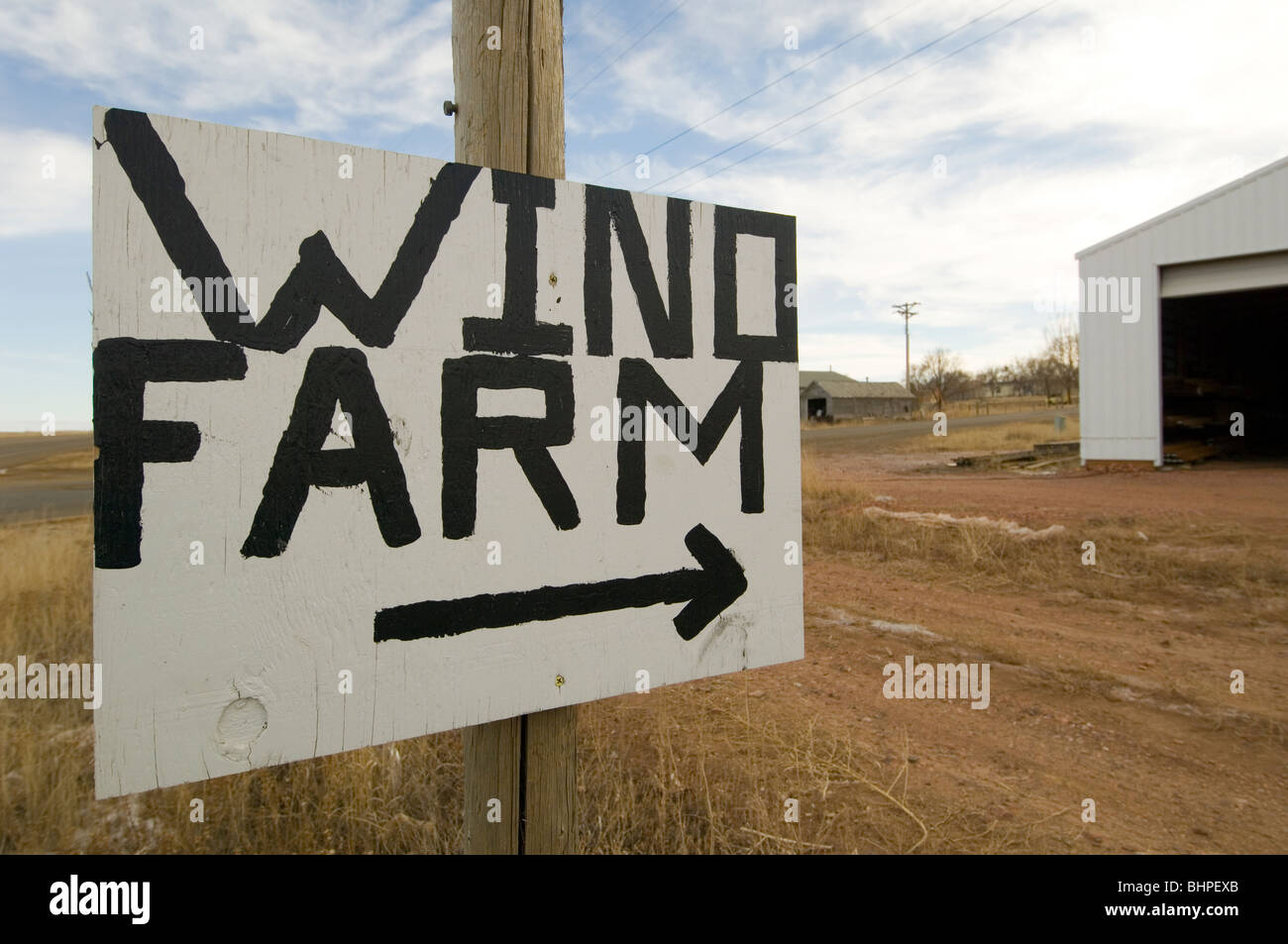 wind farm sign pointing to a road to a wind farm Stock Photo - Alamy