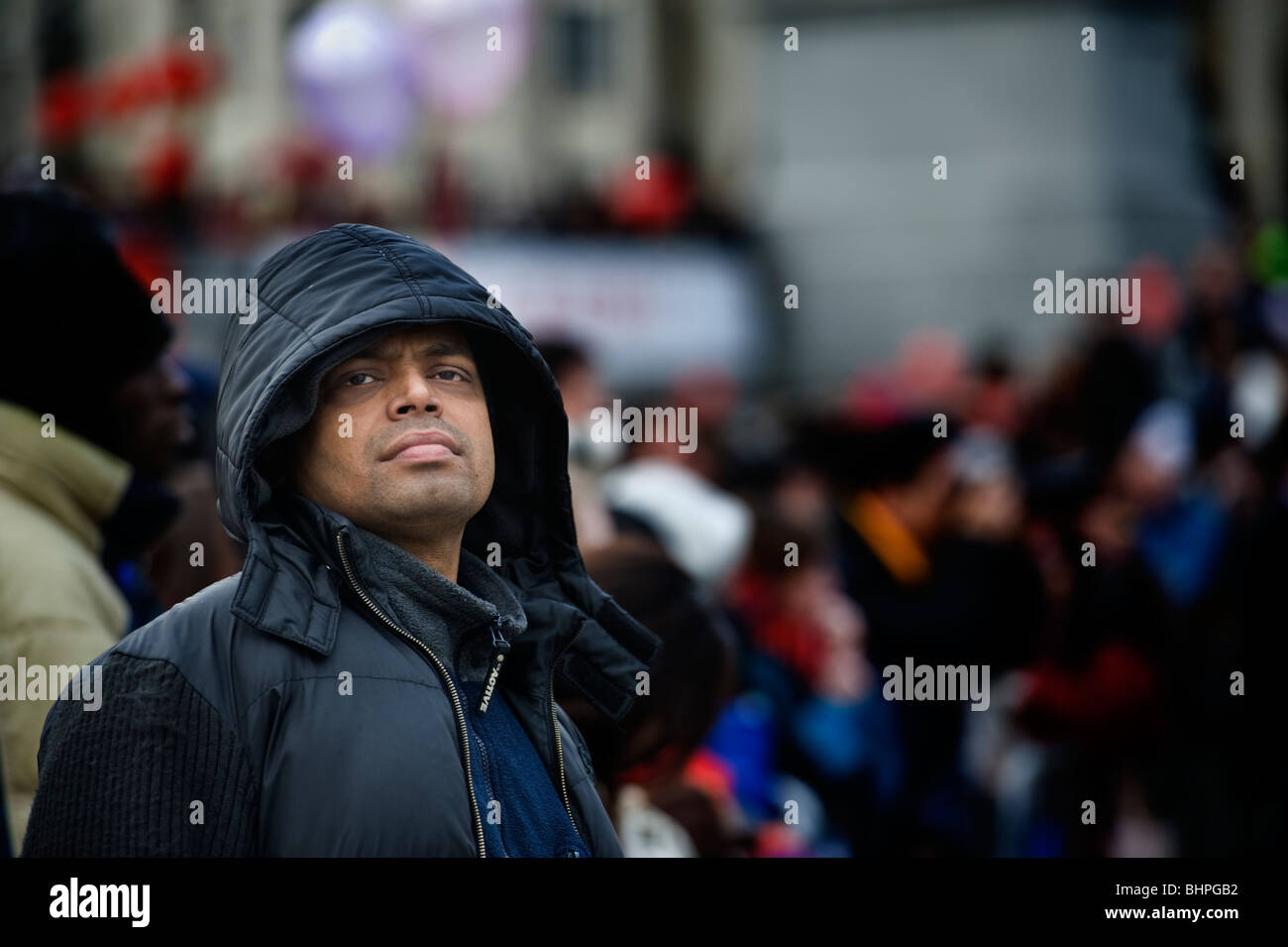 face of an Asian man in a crowd of people at Chinese New Year ...