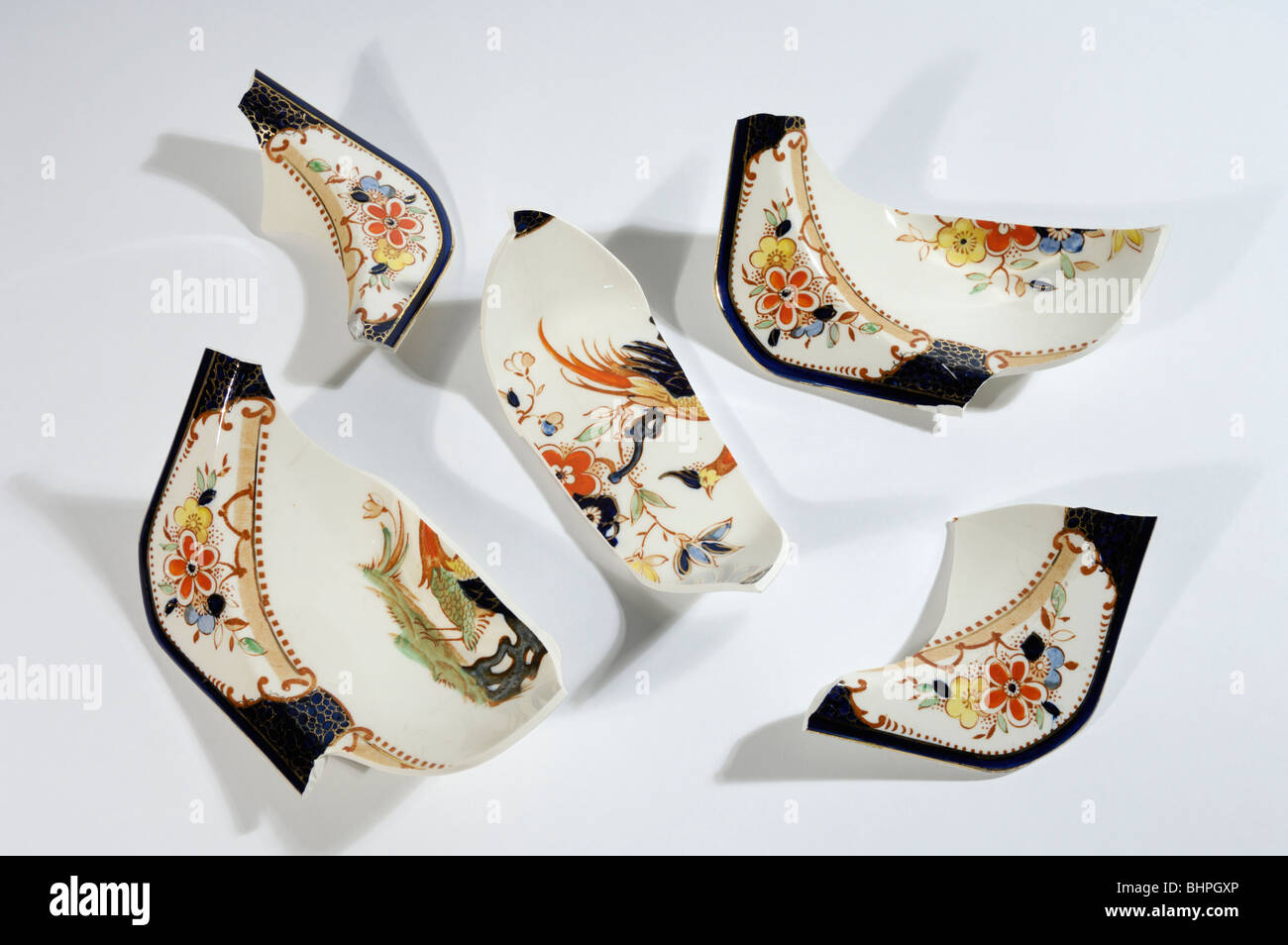 Broken china dishes Stock Photo - Alamy