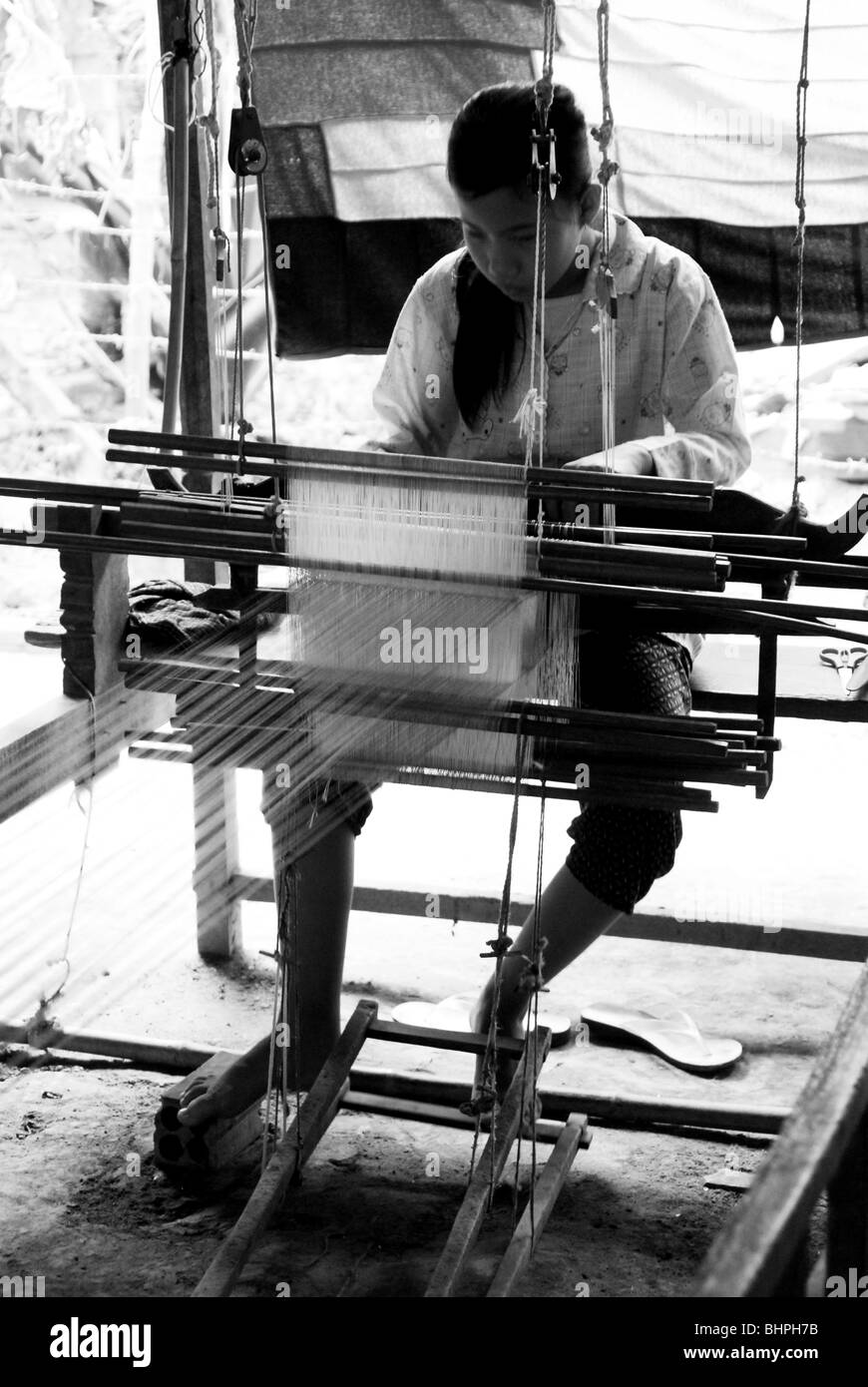 young girl weaving , fishing community , mekong river , phnom penh ...