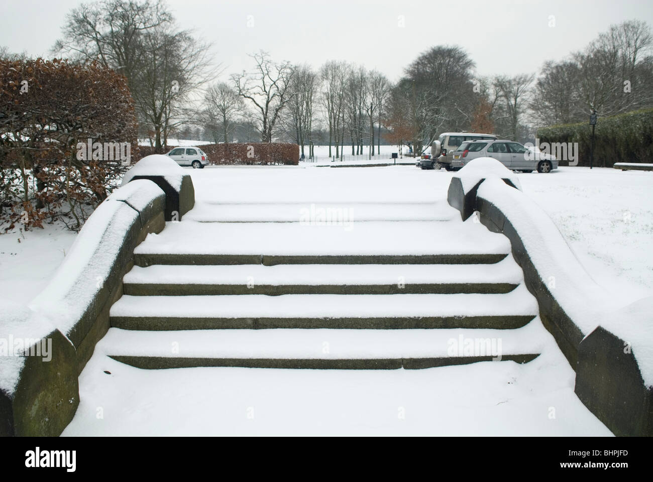 Steps covered with snow in Heaton park Manchester UK Stock Photo - Alamy