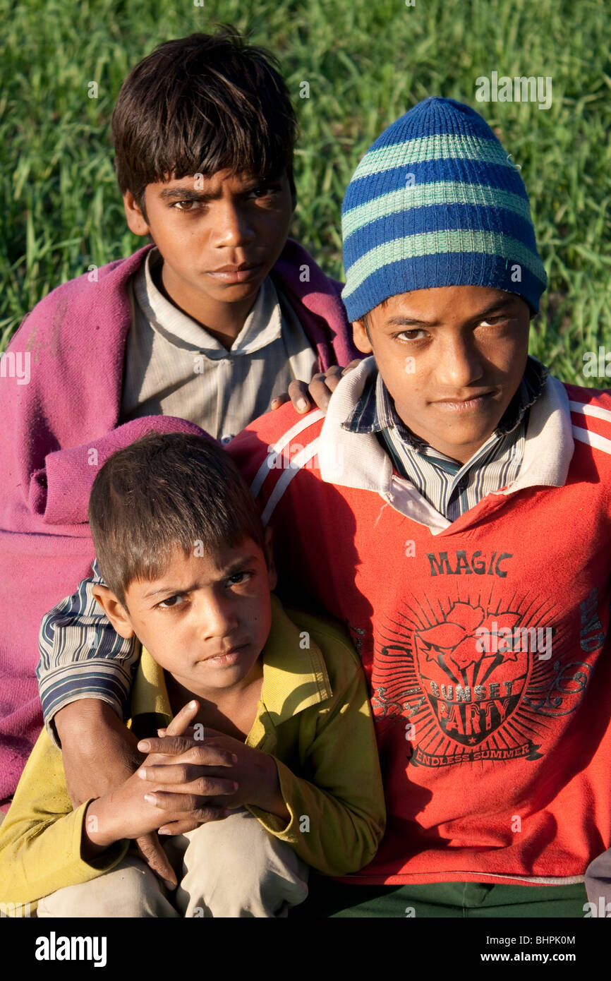 Three children from a farmers family Stock Photo - Alamy