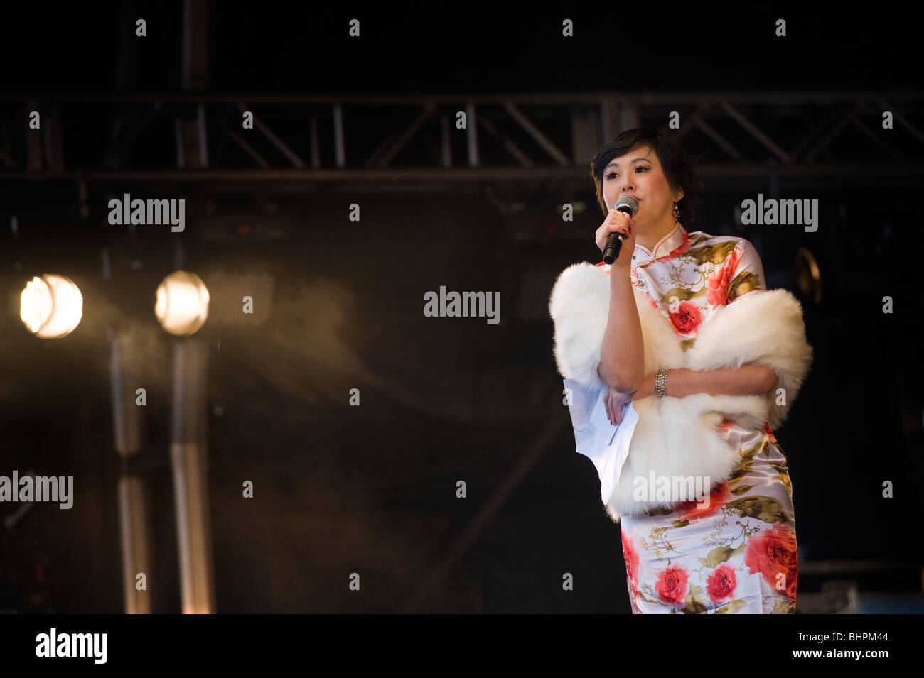 Chinese lady performer and singer on stage at the Chinese New Year ...