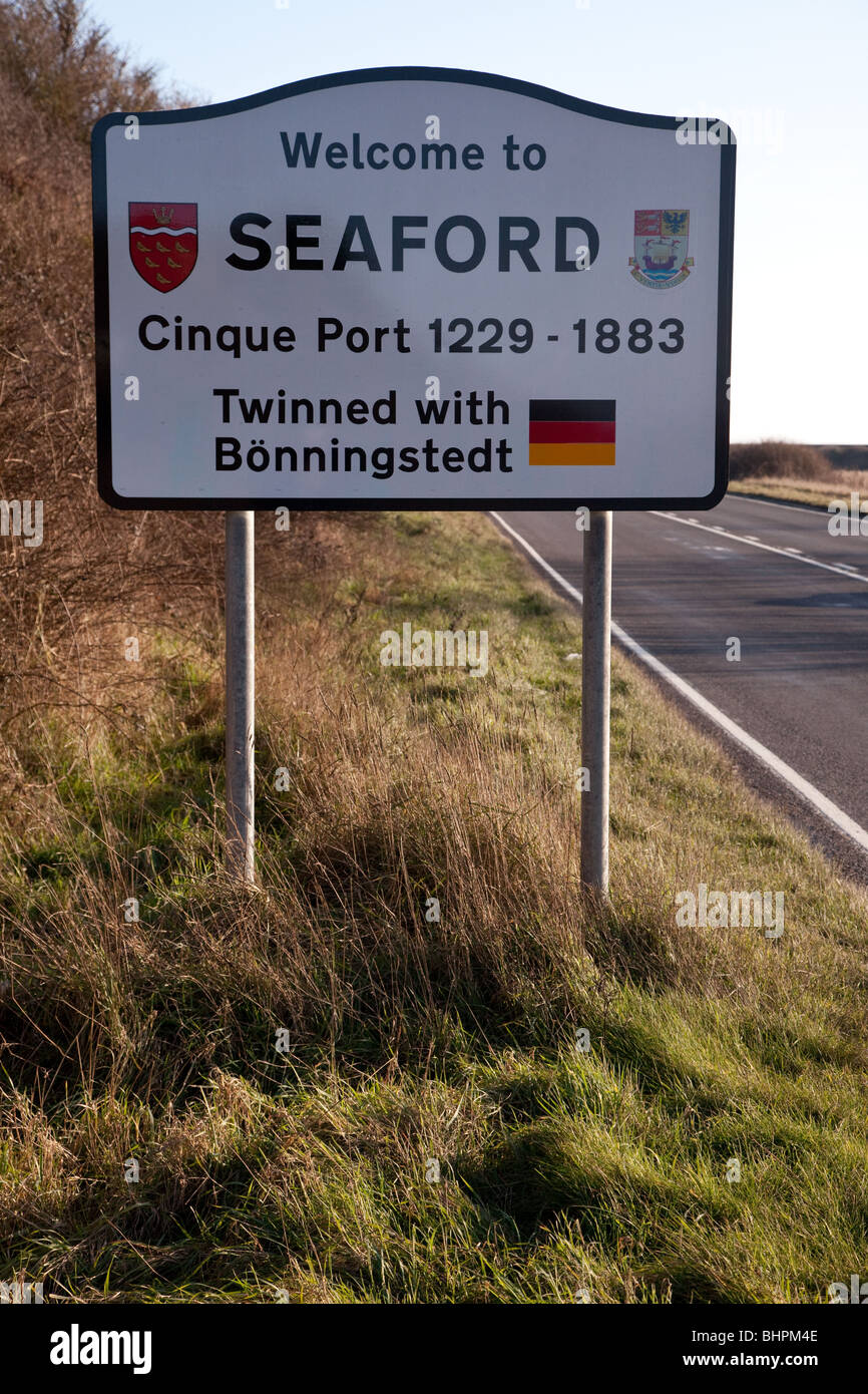 A road or boundary sign advising that the Sussex town of Seaford is ...