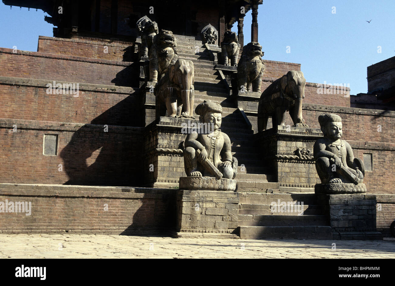 Stone guardian statues on the Hindu Nyatapola templein Durbar Square ...