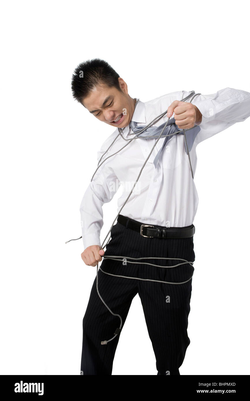 Man tied up with cables hi-res stock photography and images - Alamy